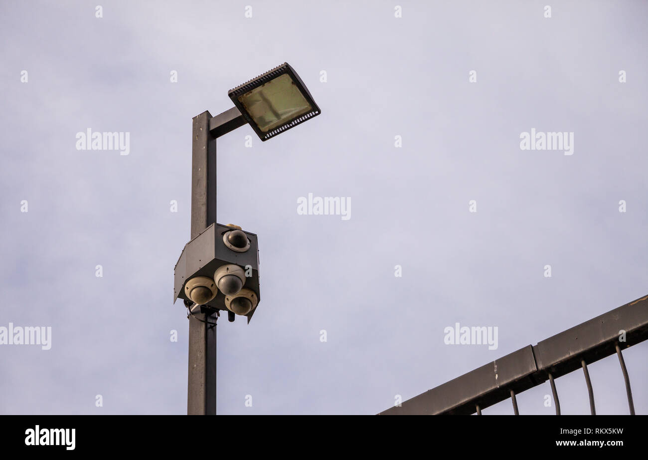 Outdoor security cameras and lights isolated against the sky Stock ...