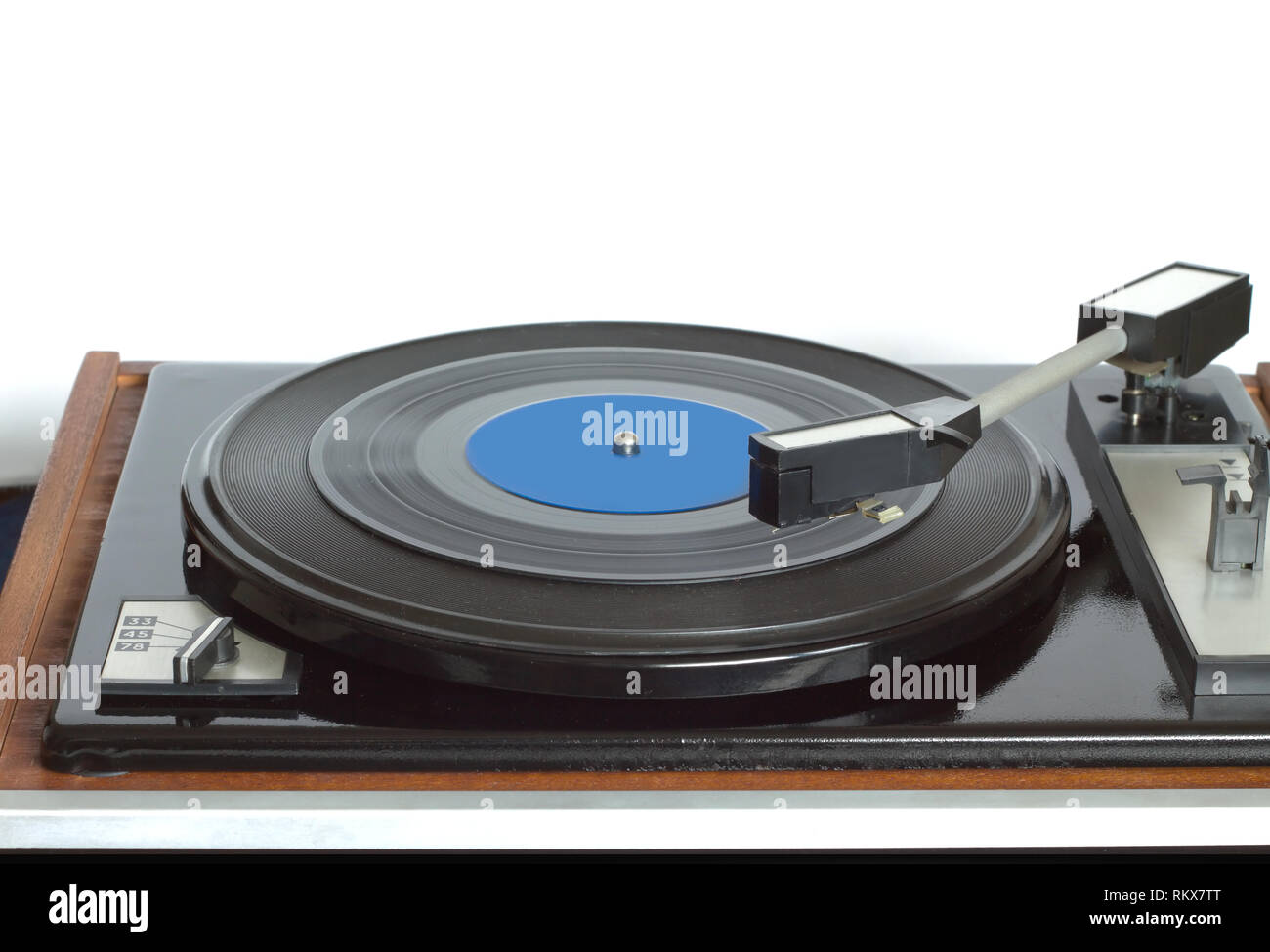 Old vintage turntable in brown wooden case with rotation vinyl record ...