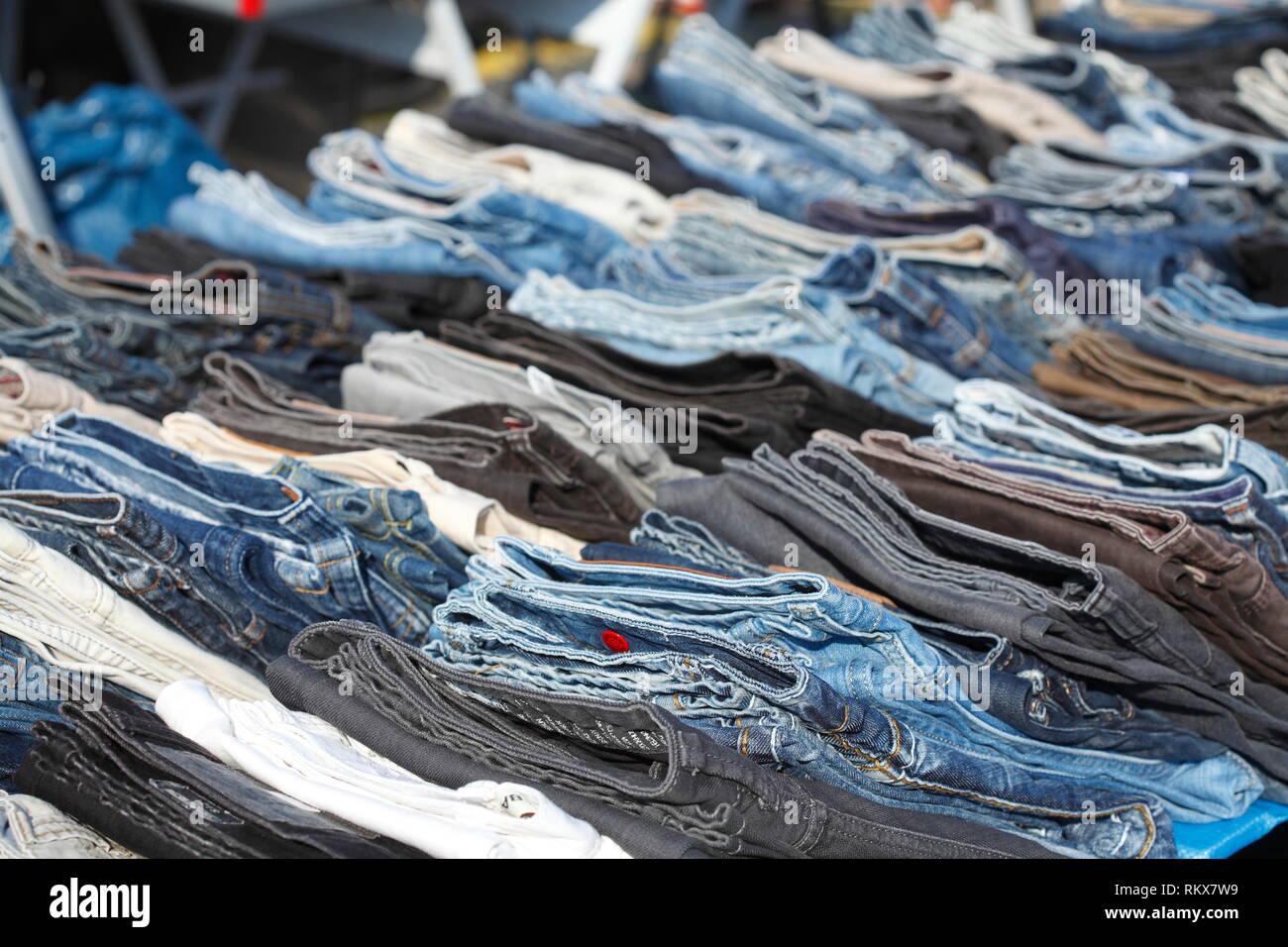 blue jeans lying on a market stall, Germany, Europe Stock Photo - Alamy