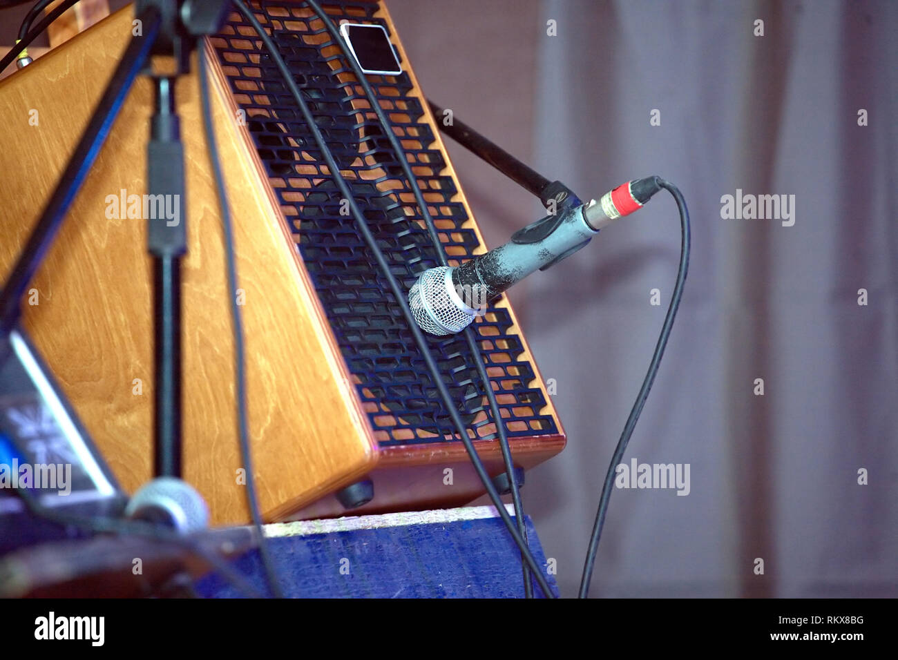 Sound amplifying equipment: microphone and mid size sound speaker ...