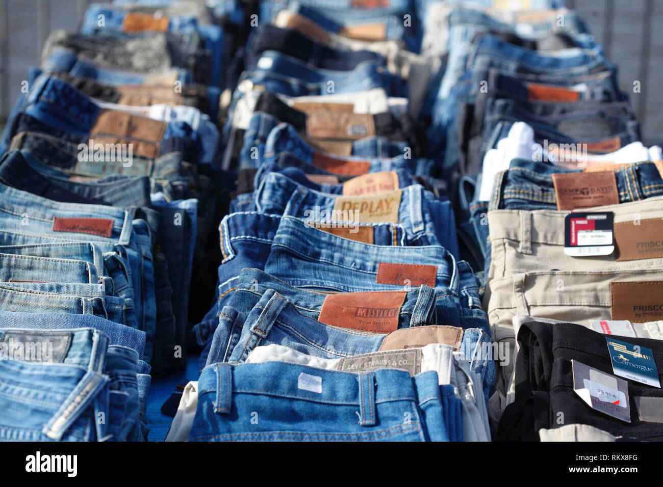 blue jeans lying on a market stall, Germany, Europe Stock Photo - Alamy