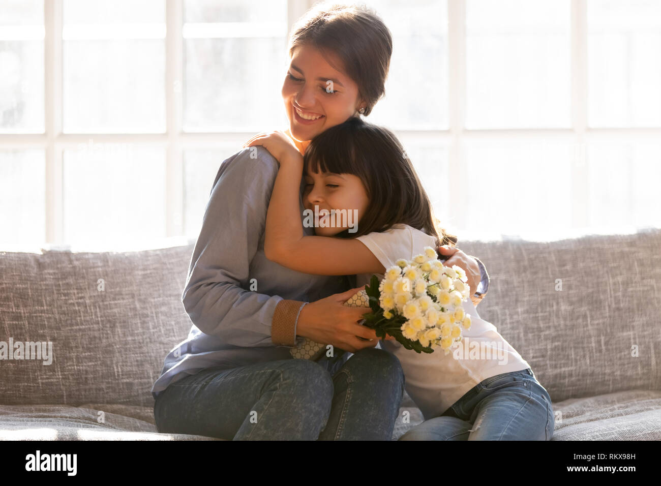 Mum child hugging hi-res stock photography and images - Alamy