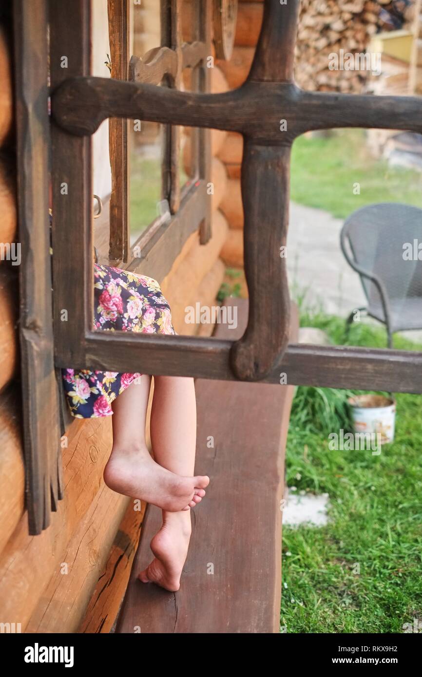 Feet on windowsill hi-res stock photography and images - Alamy