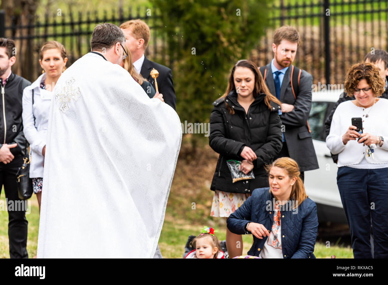 Sprinkling holy water hi-res stock photography and images - Alamy
