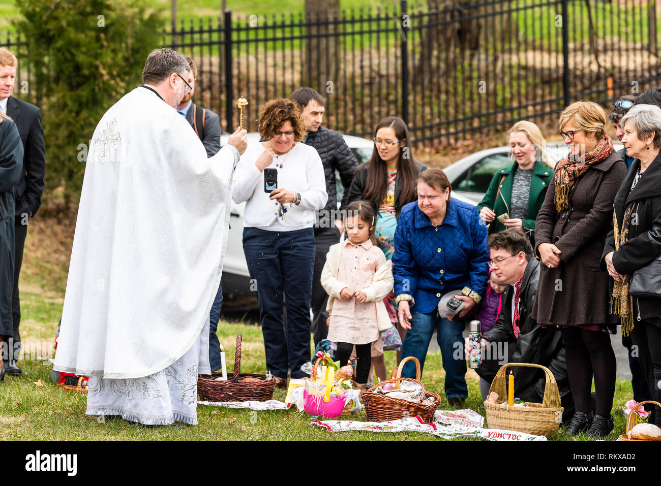 Washington DC, USA - April 1, 2018: People priest praying holding ...
