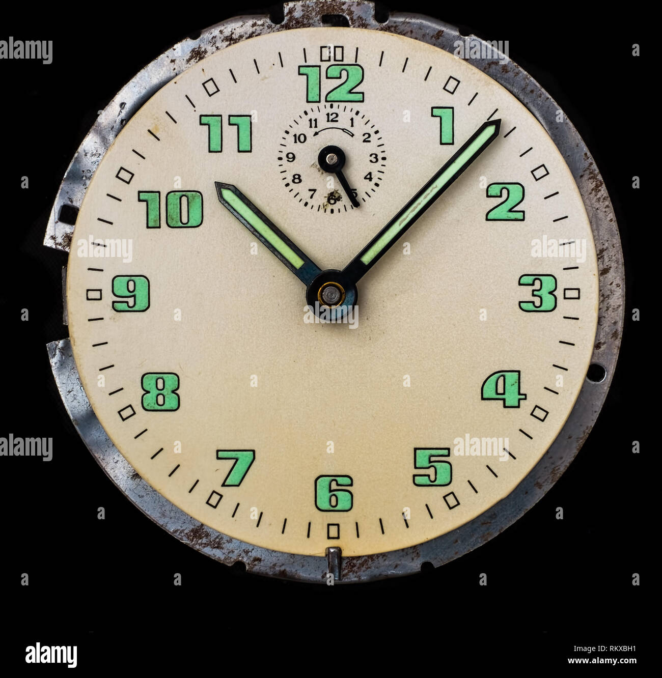 old watch dial on black background Stock Photo - Alamy