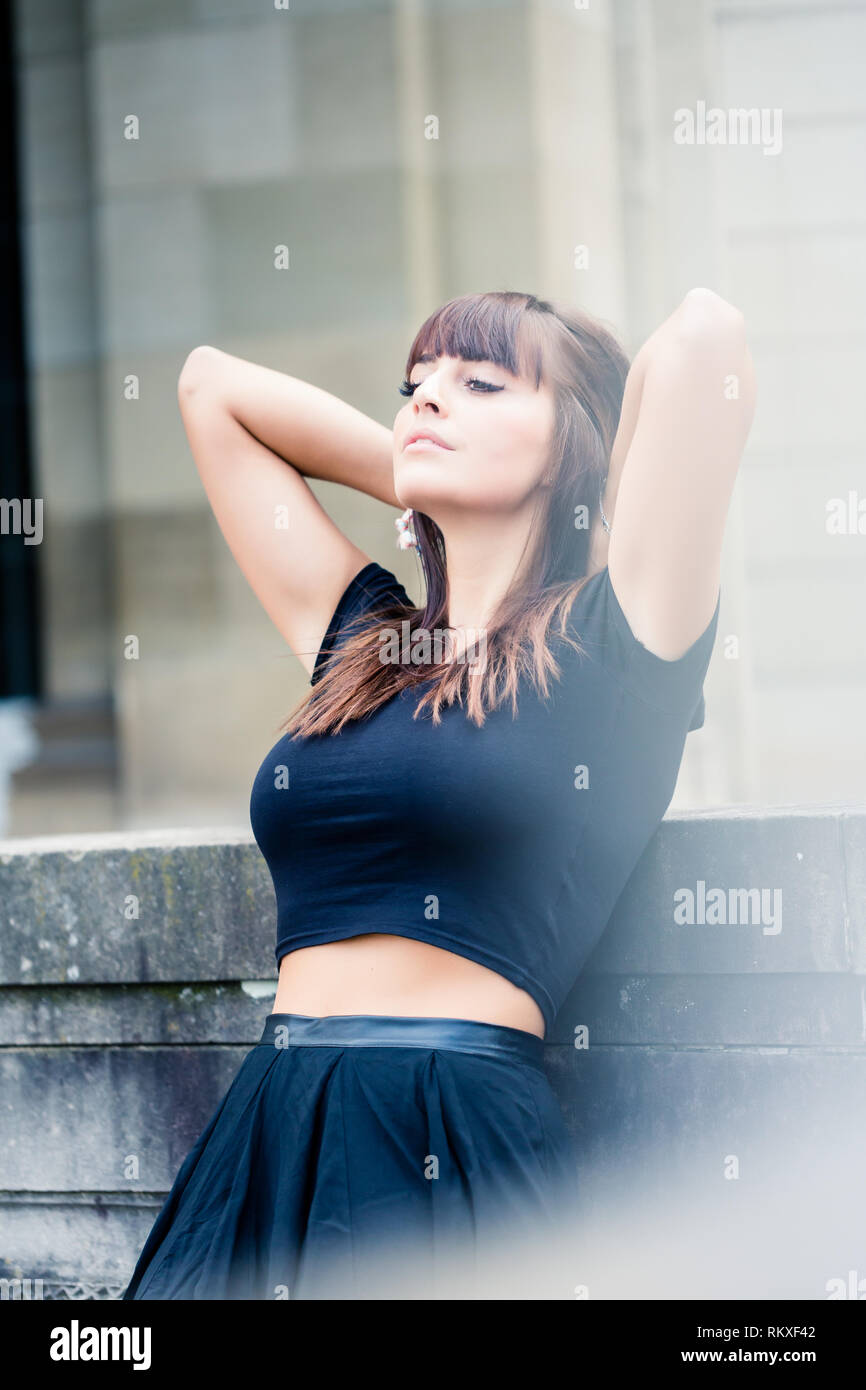 Putting her hands on her head hi-res stock photography and images - Alamy