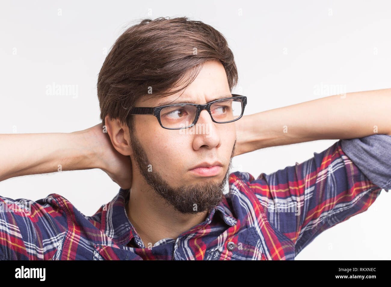 People, gesture and emotions concept - Sad or angry bearded man on ...