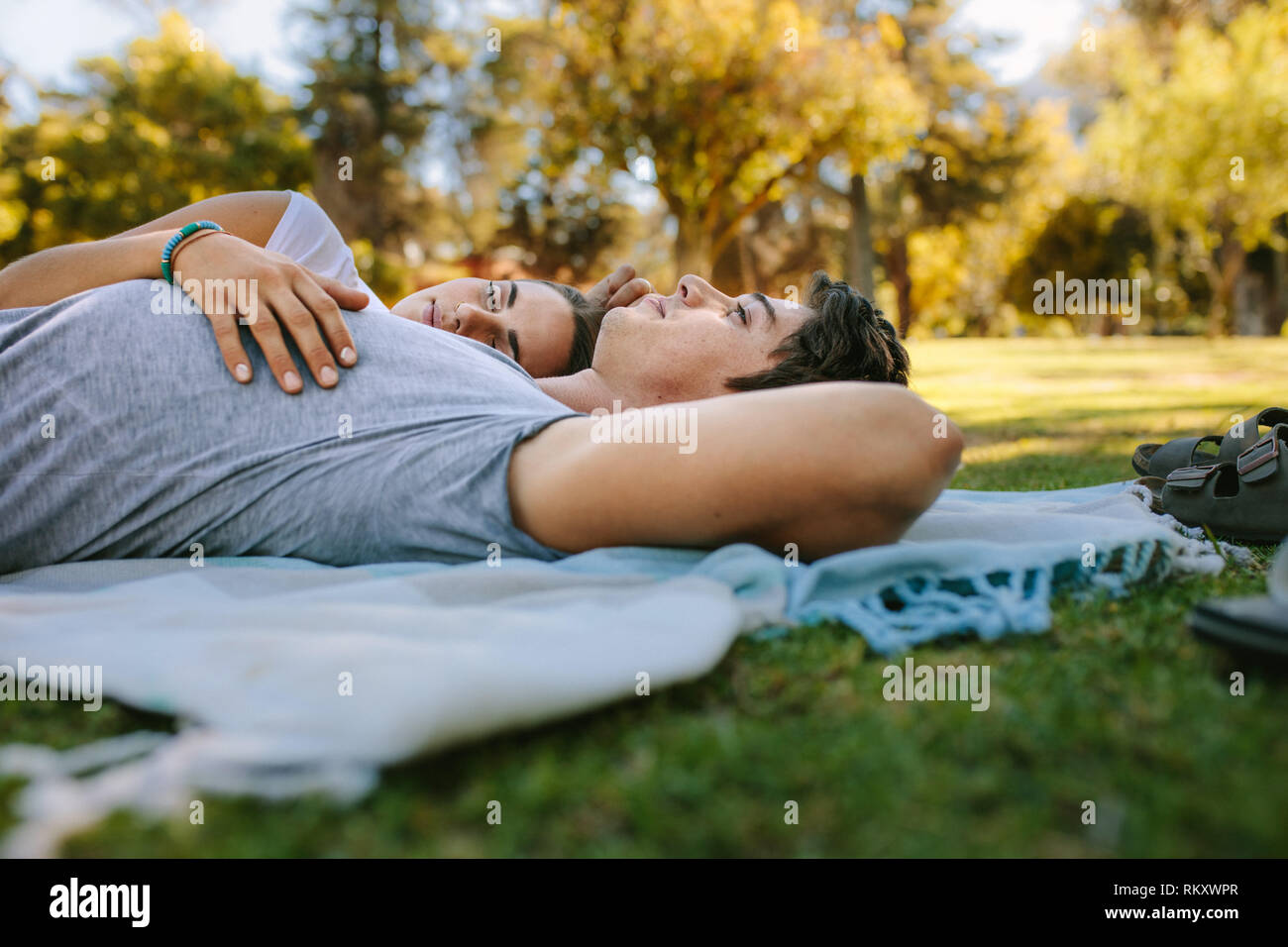 Sleeping on arm hi-res stock photography and images - Alamy