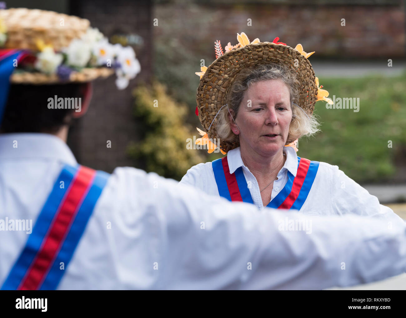 English morris dancers in traditional costume, including flowers and ...