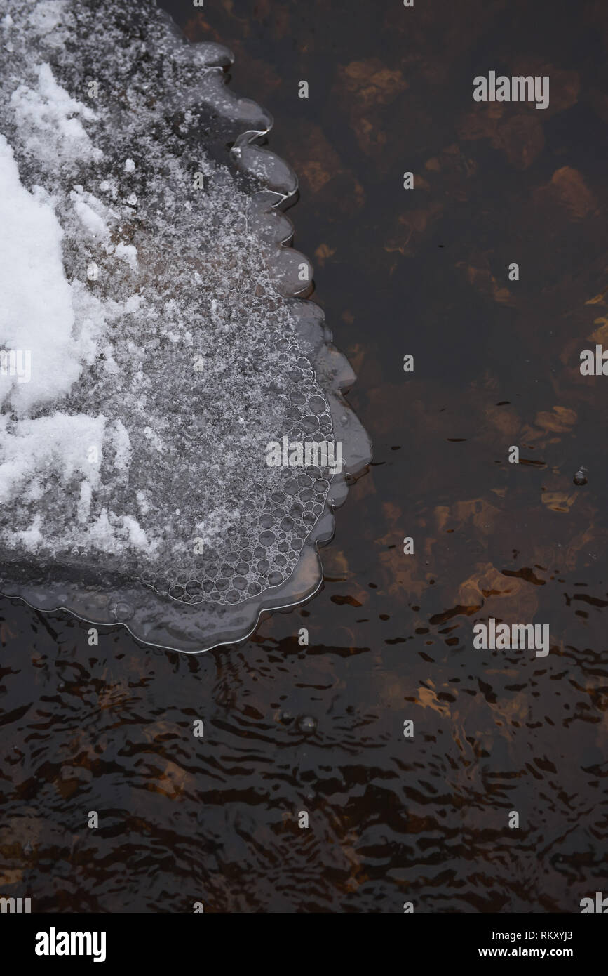 Spring melting of ice and the flow of water Stock Photo - Alamy