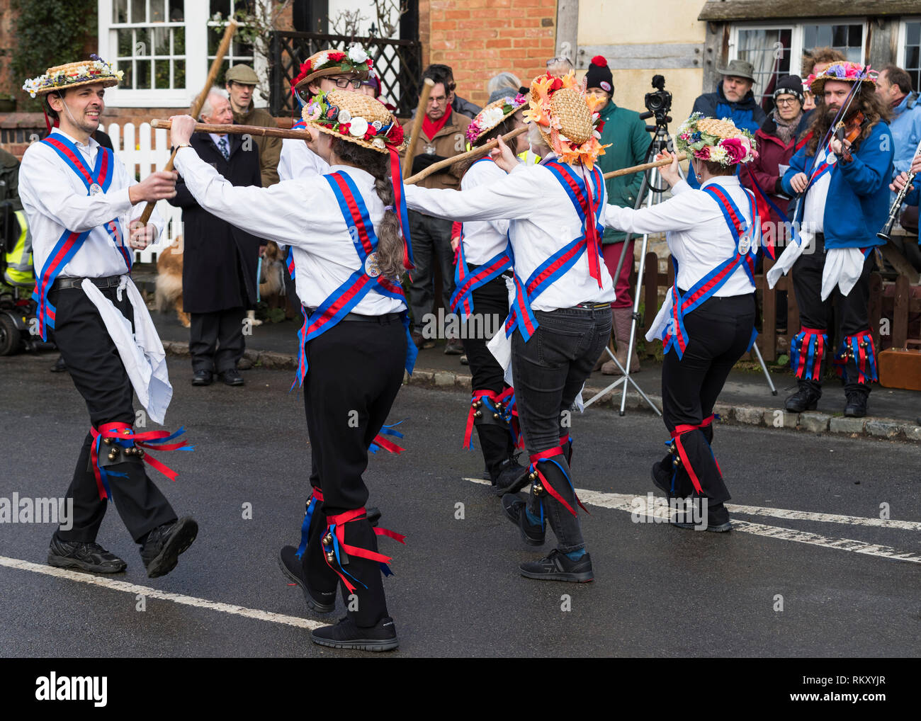 English morris dancers in traditional costume, including flowers and ...