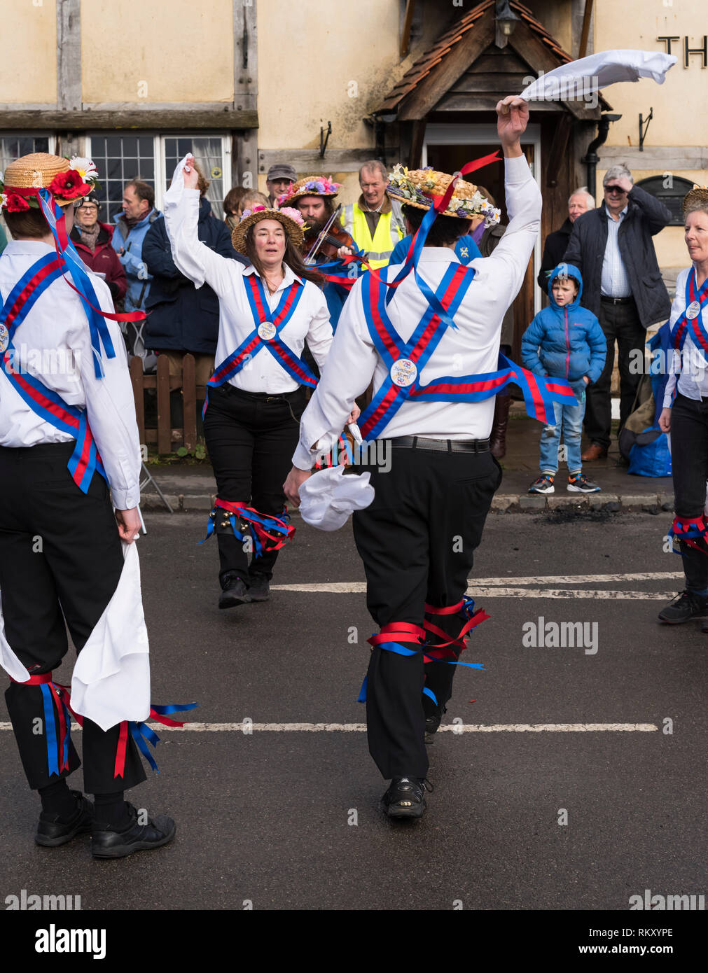 English morris dancers in traditional costume, including flowers and ...