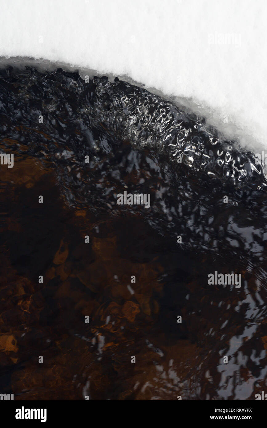 Spring melting of ice and the flow of water Stock Photo - Alamy