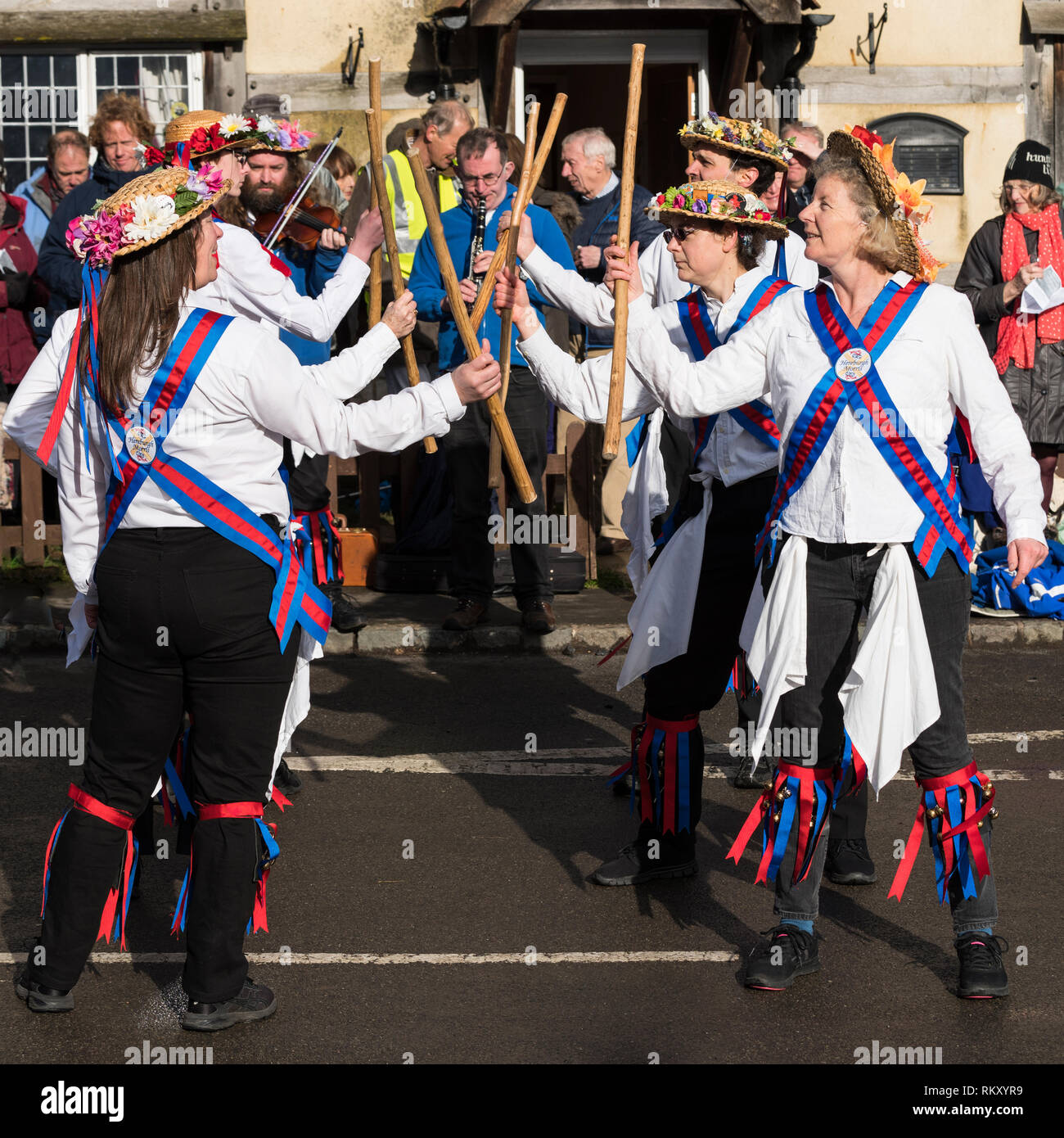 English morris dancers in traditional costume, including flowers and ...