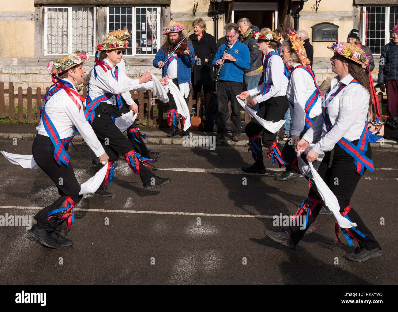 English morris dancers in traditional costume, including flowers and ...