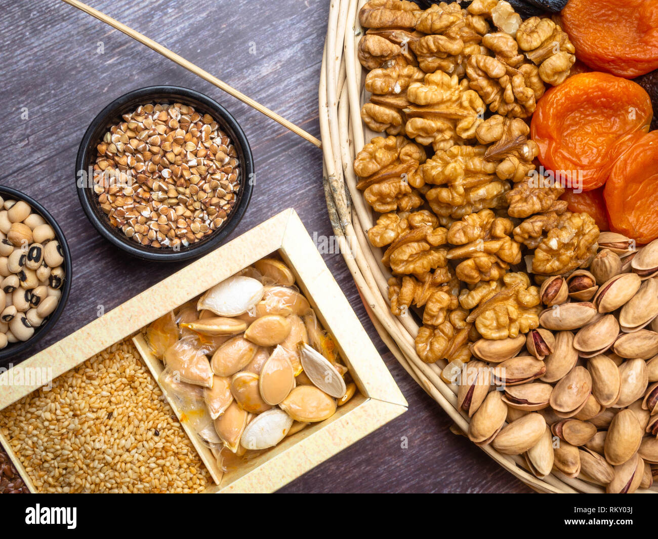 Legumes bean seed buckweat apricots wheat nuts top view, healthy snack ...