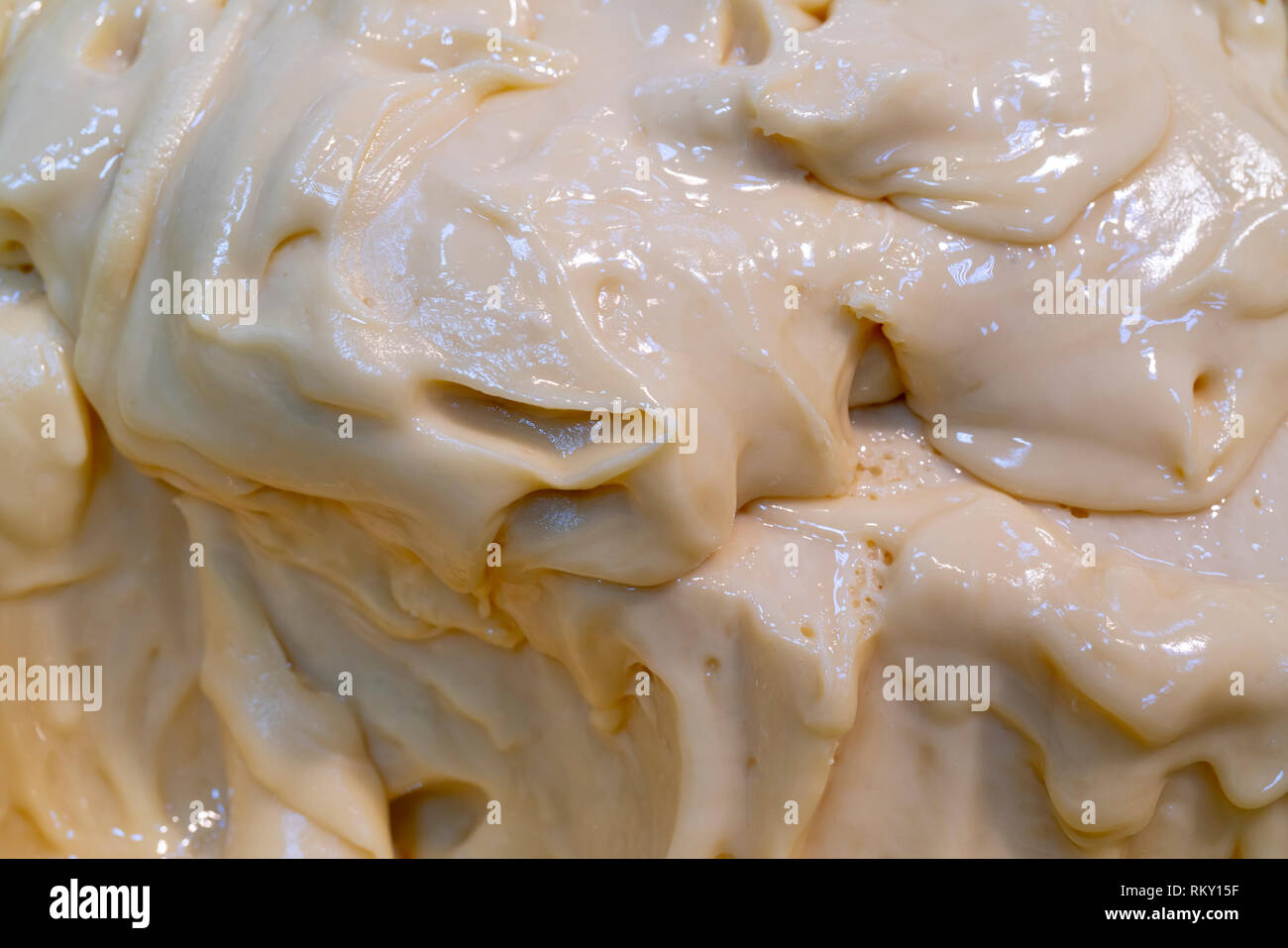 Natural honey texture Stock Photo - Alamy