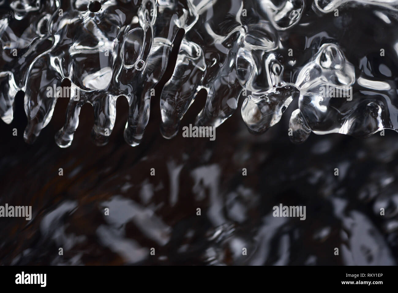 Spring melting of ice and the flow of water Stock Photo - Alamy