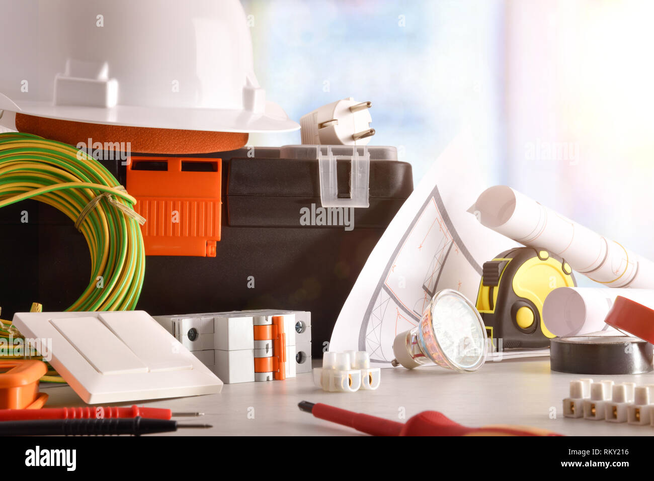 Electrician's office table with electrical equipment and installation ...