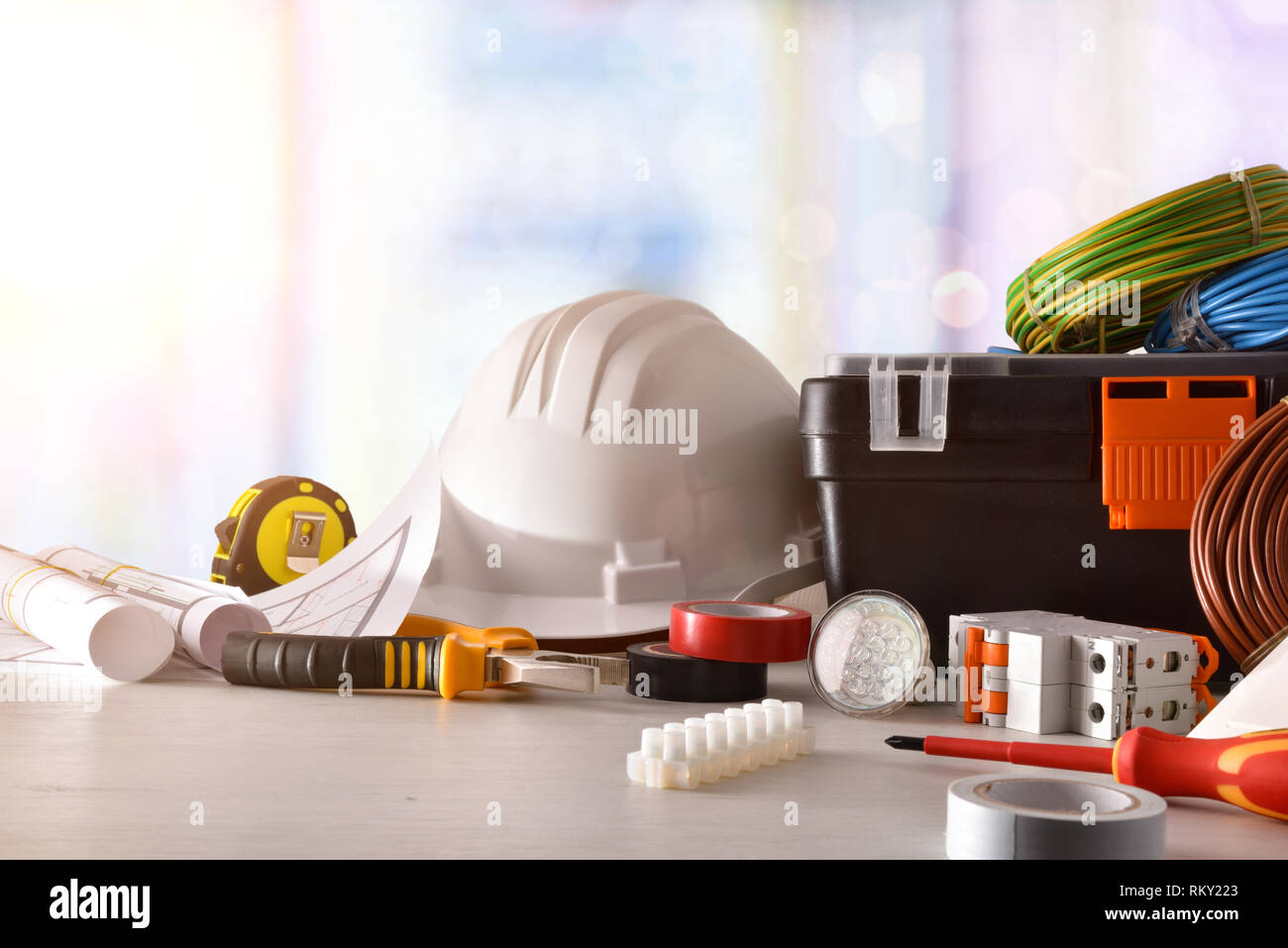 Electrician's office table with electrical equipment and installation ...