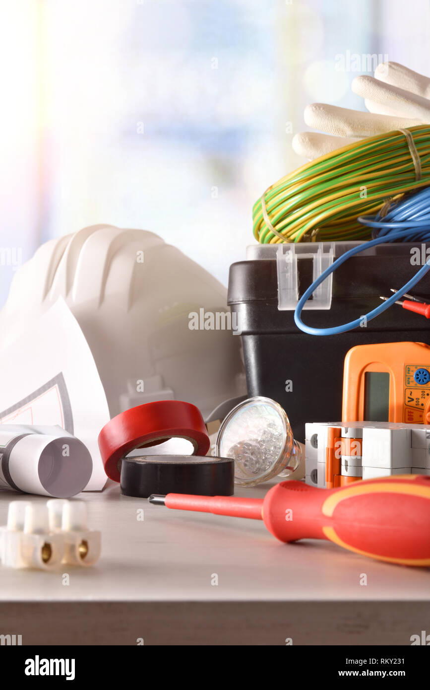 Electrician's office table with electrical equipment and installation ...
