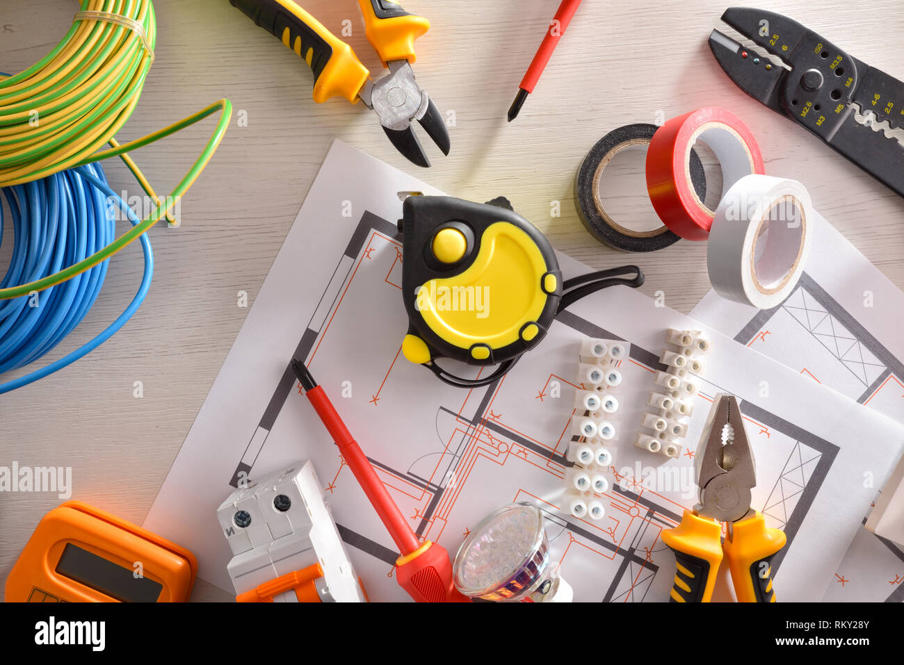 General view of equipment on white wooden table for electrical ...