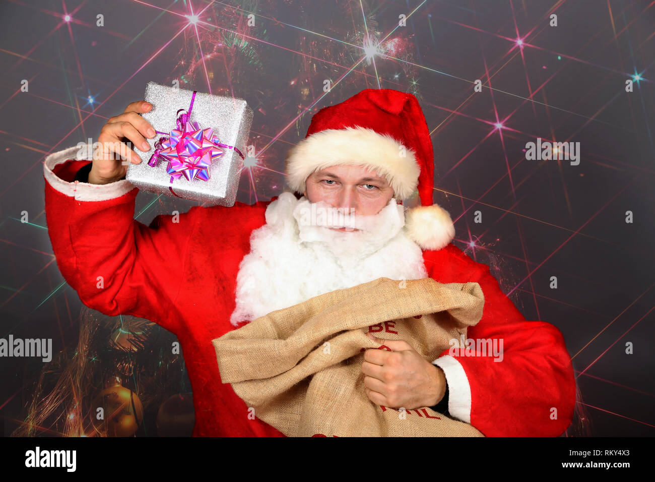 Funny Santa Claus have a fun Stock Photo - Alamy