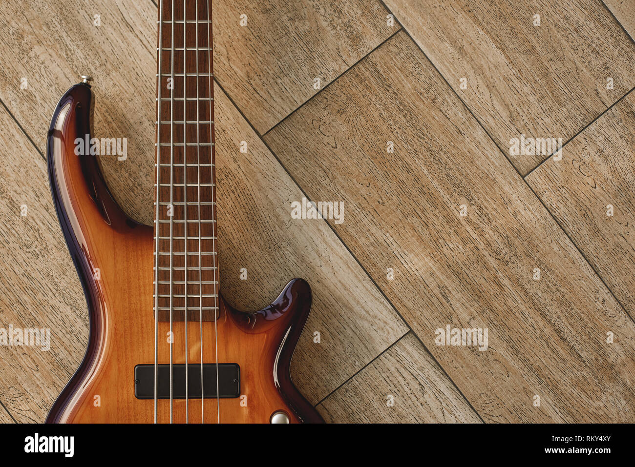 Power of musical instrument. Top view of the brown electric guitar ...