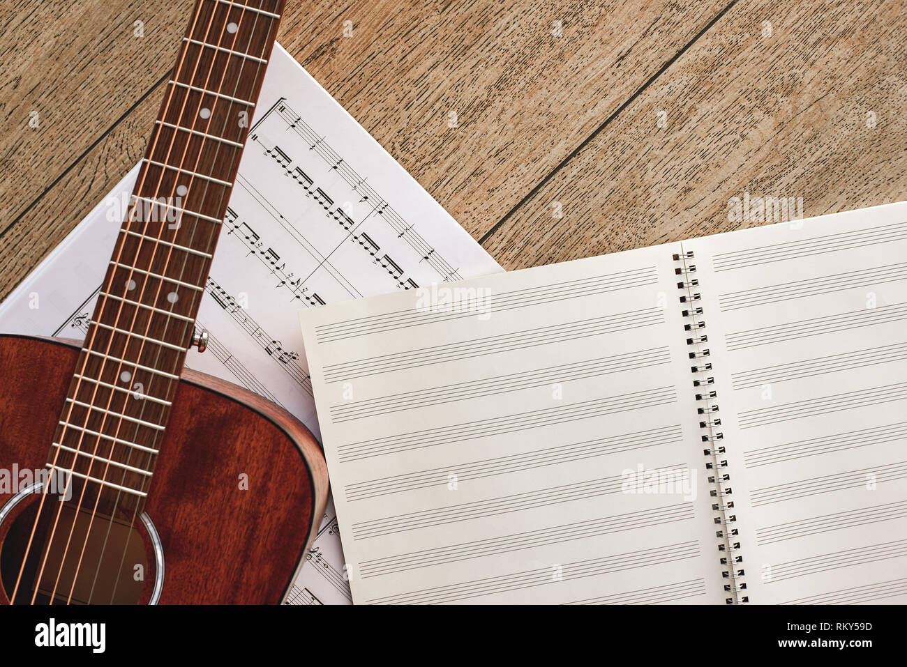 Music for Guitar. Top view of guitar and musical notes laying on the ...