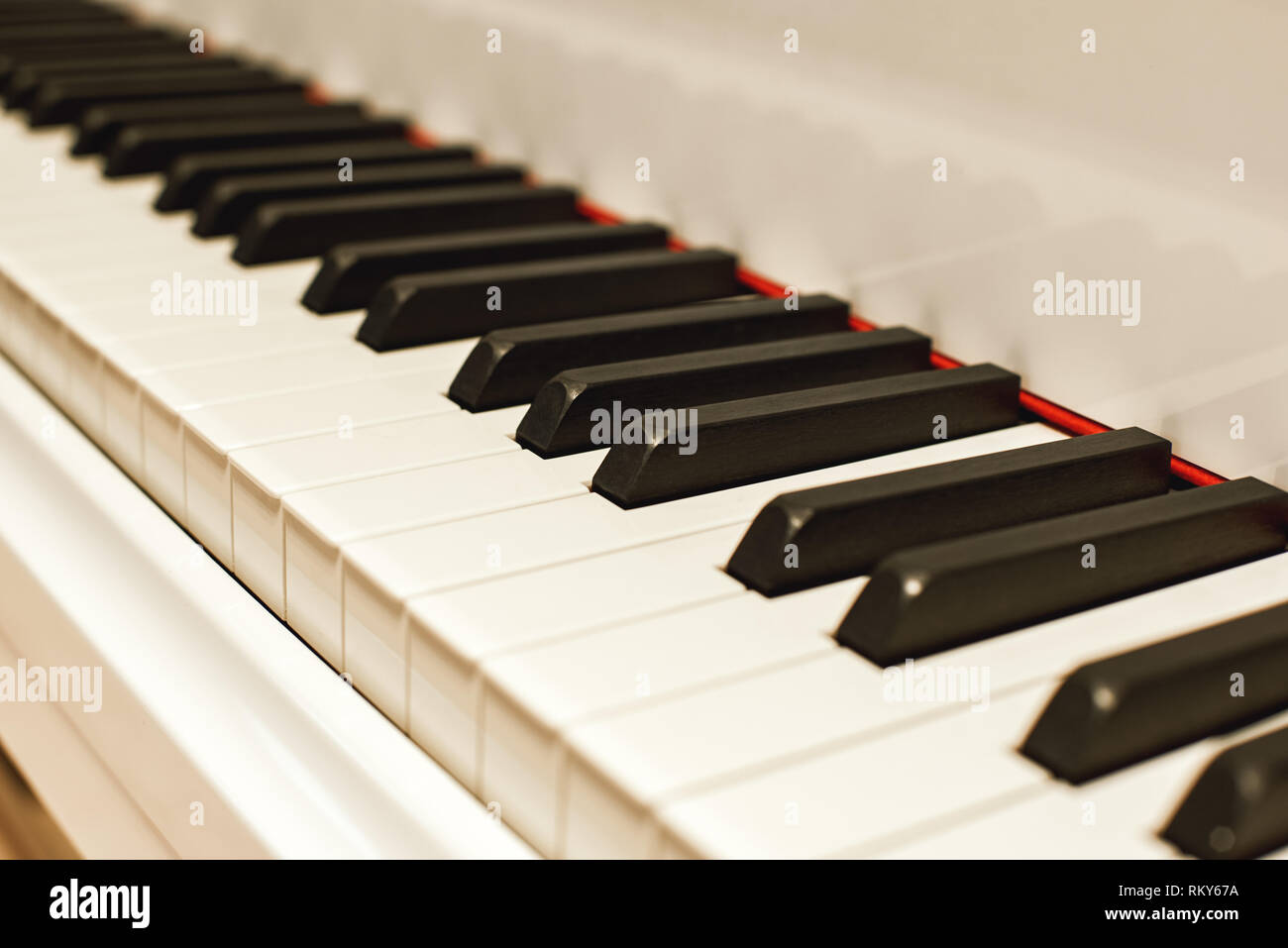 Musical journey. Side view of piano keyboard with black and white keys ...