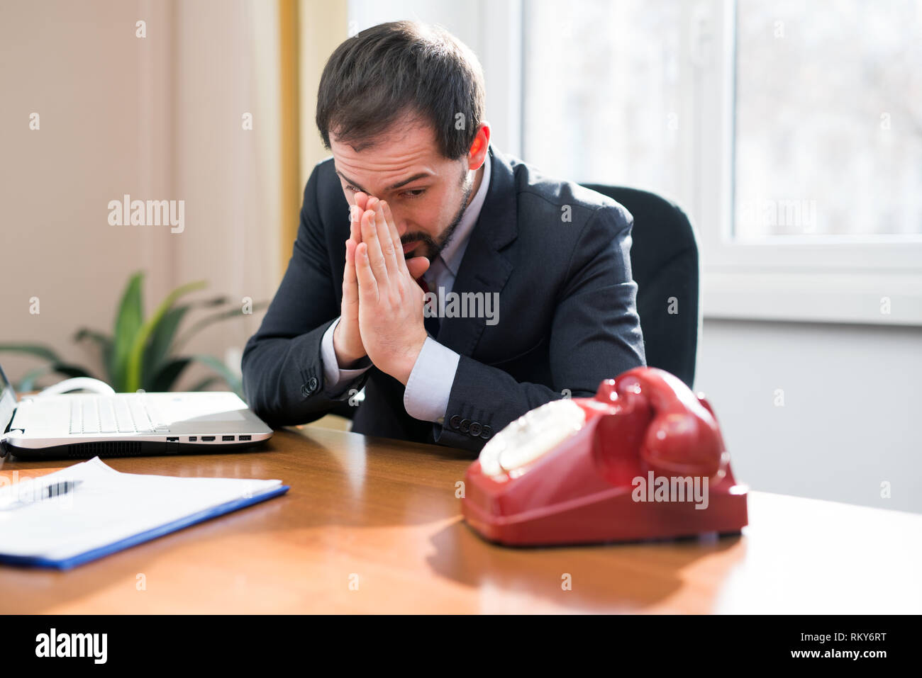 Waiting a phone call Stock Photo - Alamy