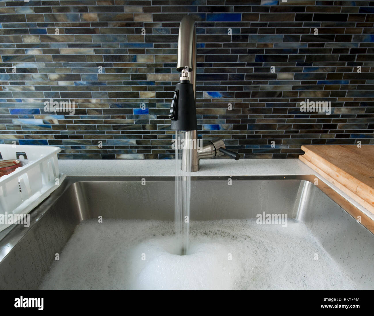 Kitchen Sink With Soapy Water Stock Photo - Alamy
