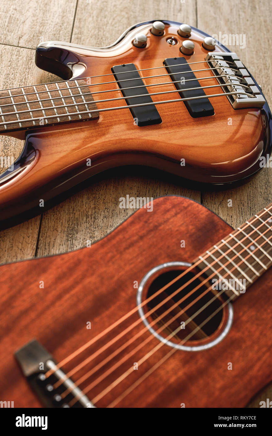 Choosing a guitar...Top view on two perfect polished musical ...