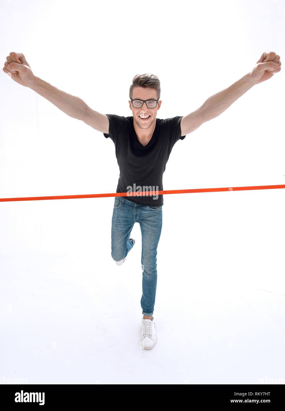 man crosses the finish line Stock Photo - Alamy