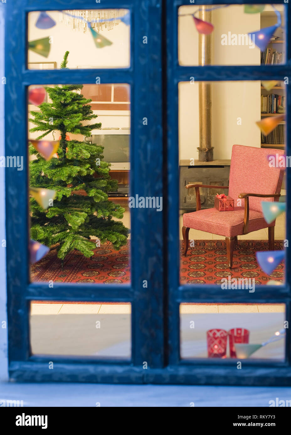 Christmas Tree through Window Stock Photo - Alamy