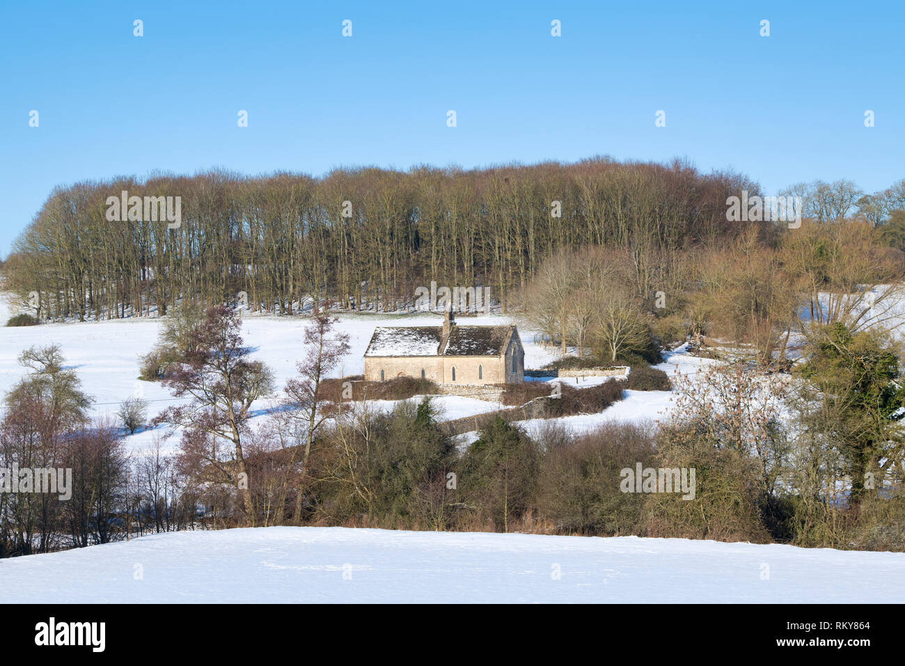 St Oswald's church in the winter snow. Widford, Cotswolds, Oxfordshire ...