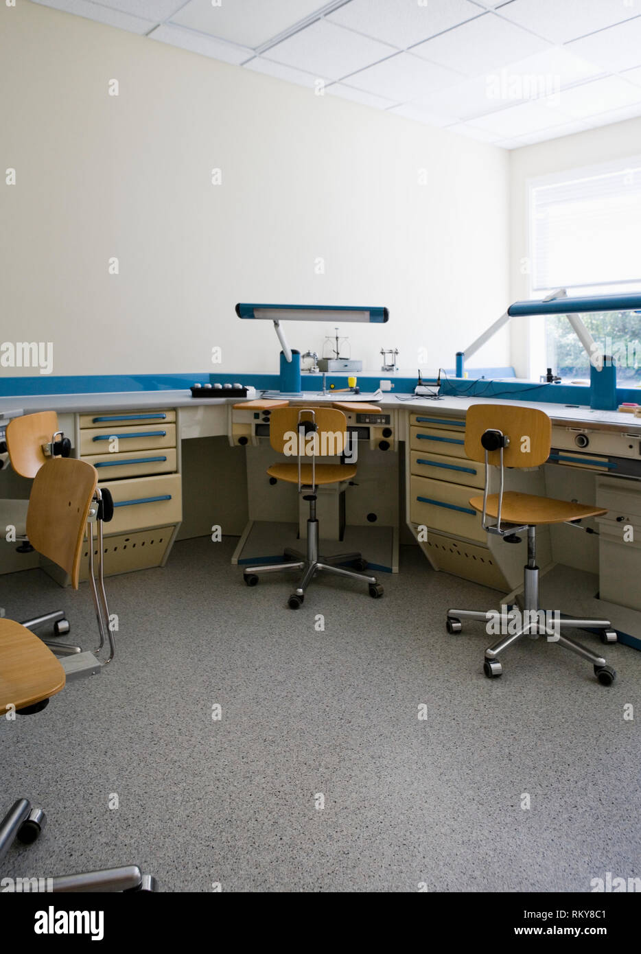 Empty work tables Stock Photo - Alamy