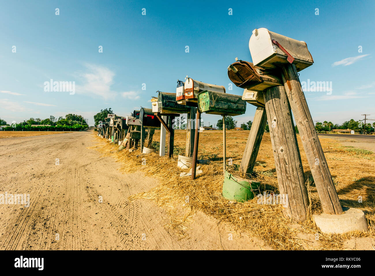 Rural mailboxes line a dirt country road Stock Photo - Alamy