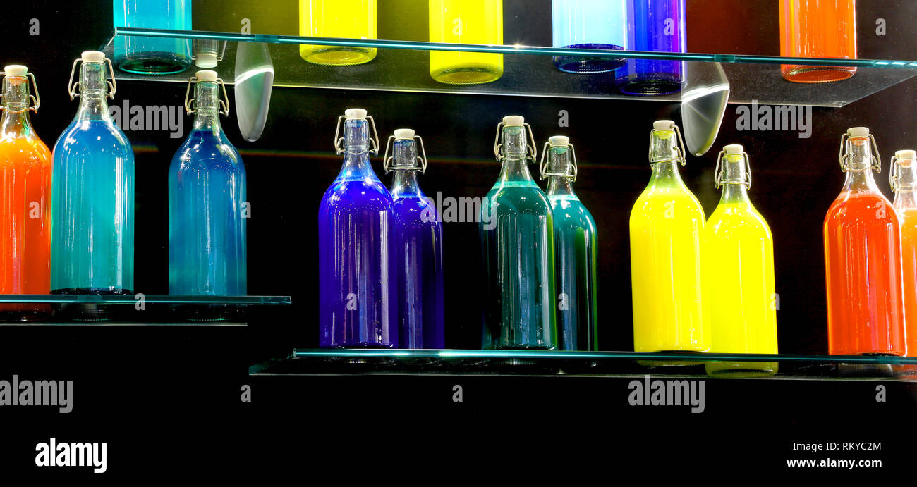 Brightly colored glass bottles hi-res stock photography and images - Alamy