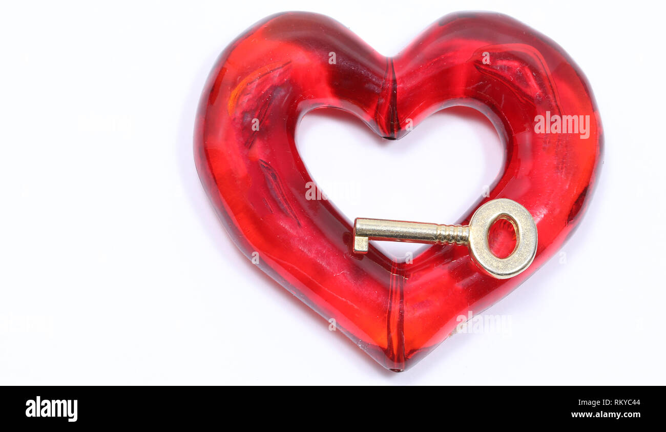 Big Red Heart and a key on white background Stock Photo - Alamy