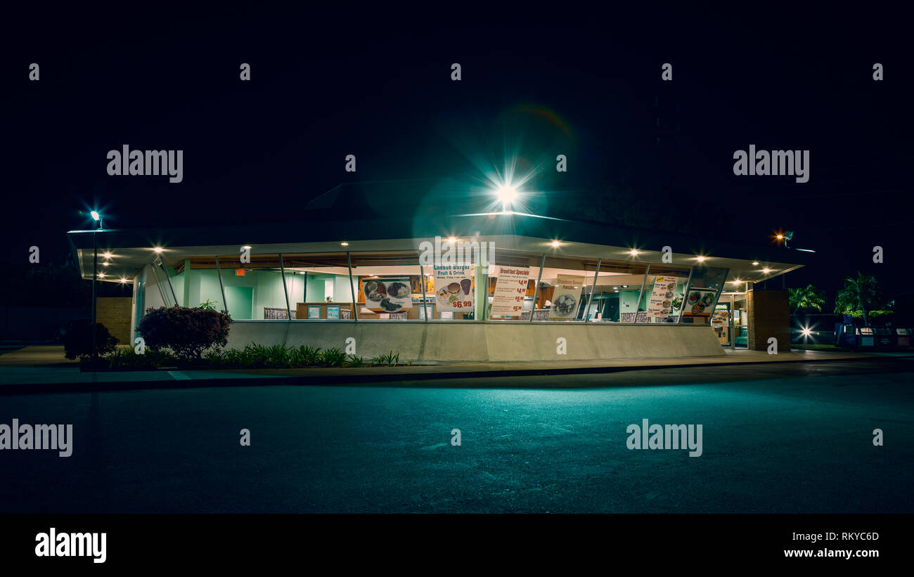 A uniquely shaped diner is seen overnight in Los Angeles in California ...