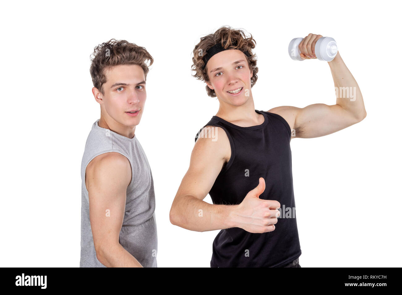 Two handsome guys doing fitness workout with weights isolated Stock ...