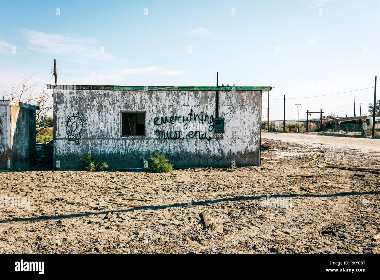 Graffiti wisdom painted on the side of an abandoned building in the ...
