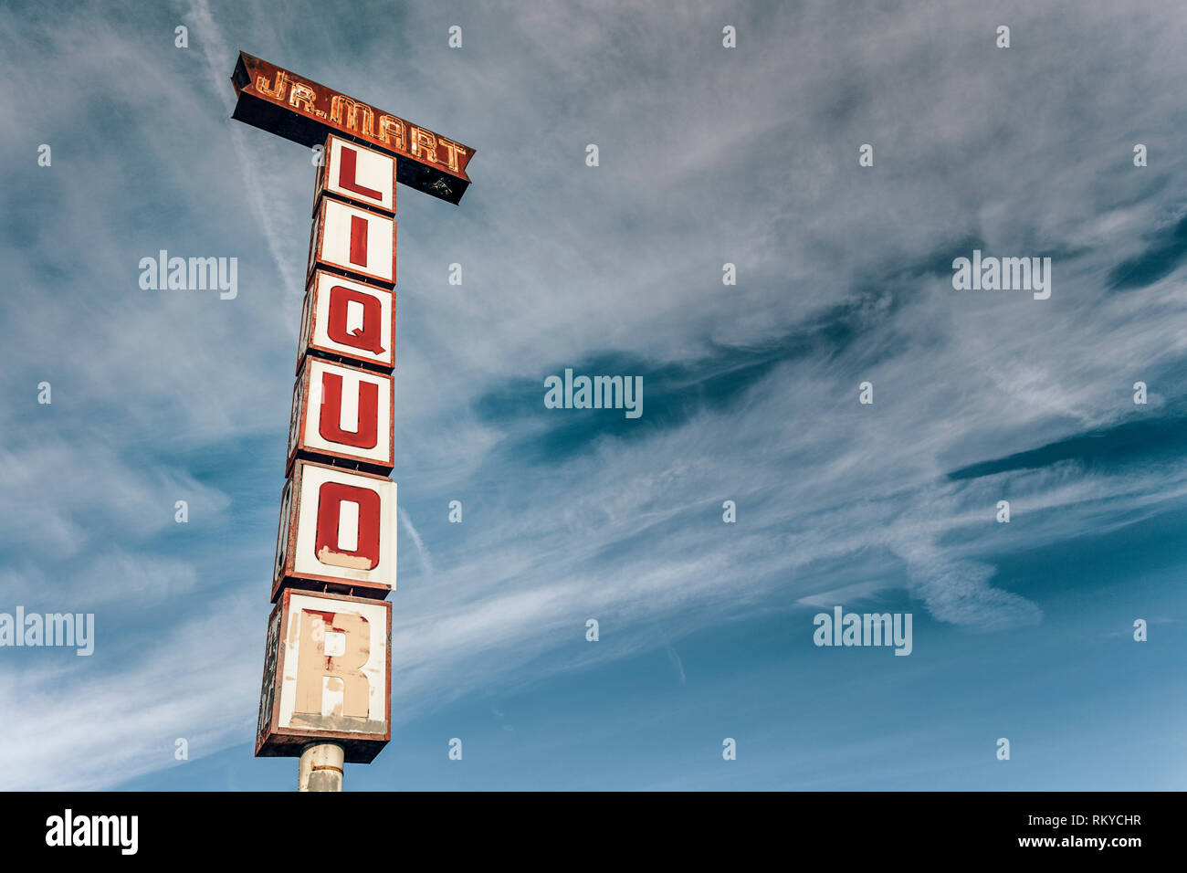 Looking up at a large liquor store sign in Los Angeles in California ...