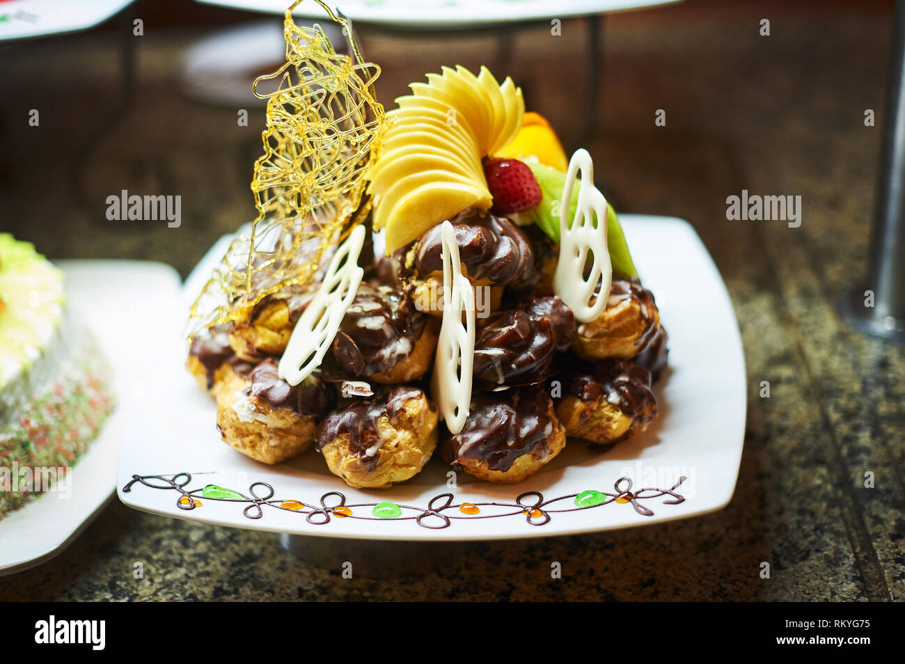 Sweets on banquet table - picture taken during catering event. Rows of ...
