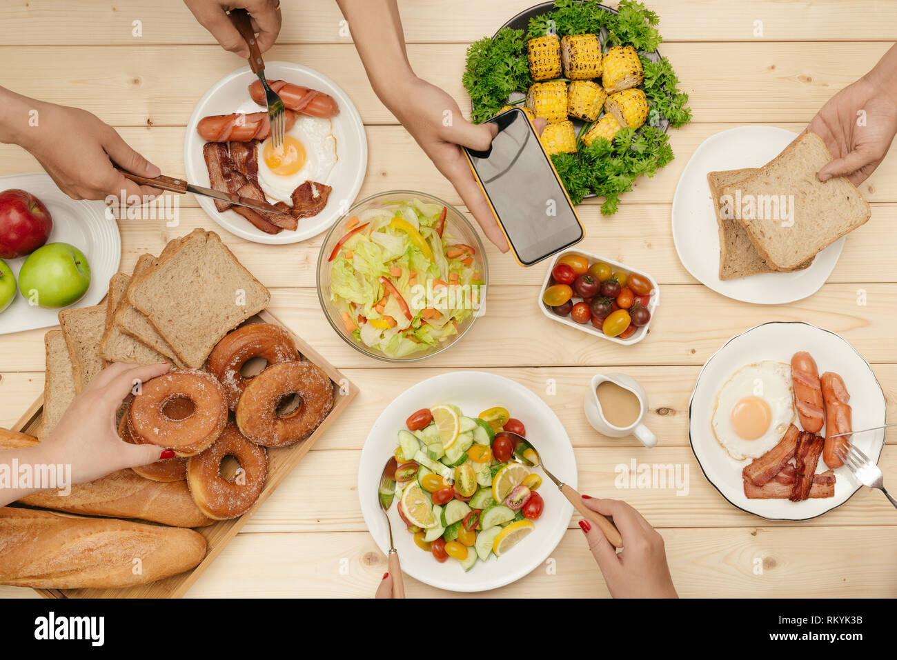 Four friends having dinner top hi-res stock photography and images - Alamy