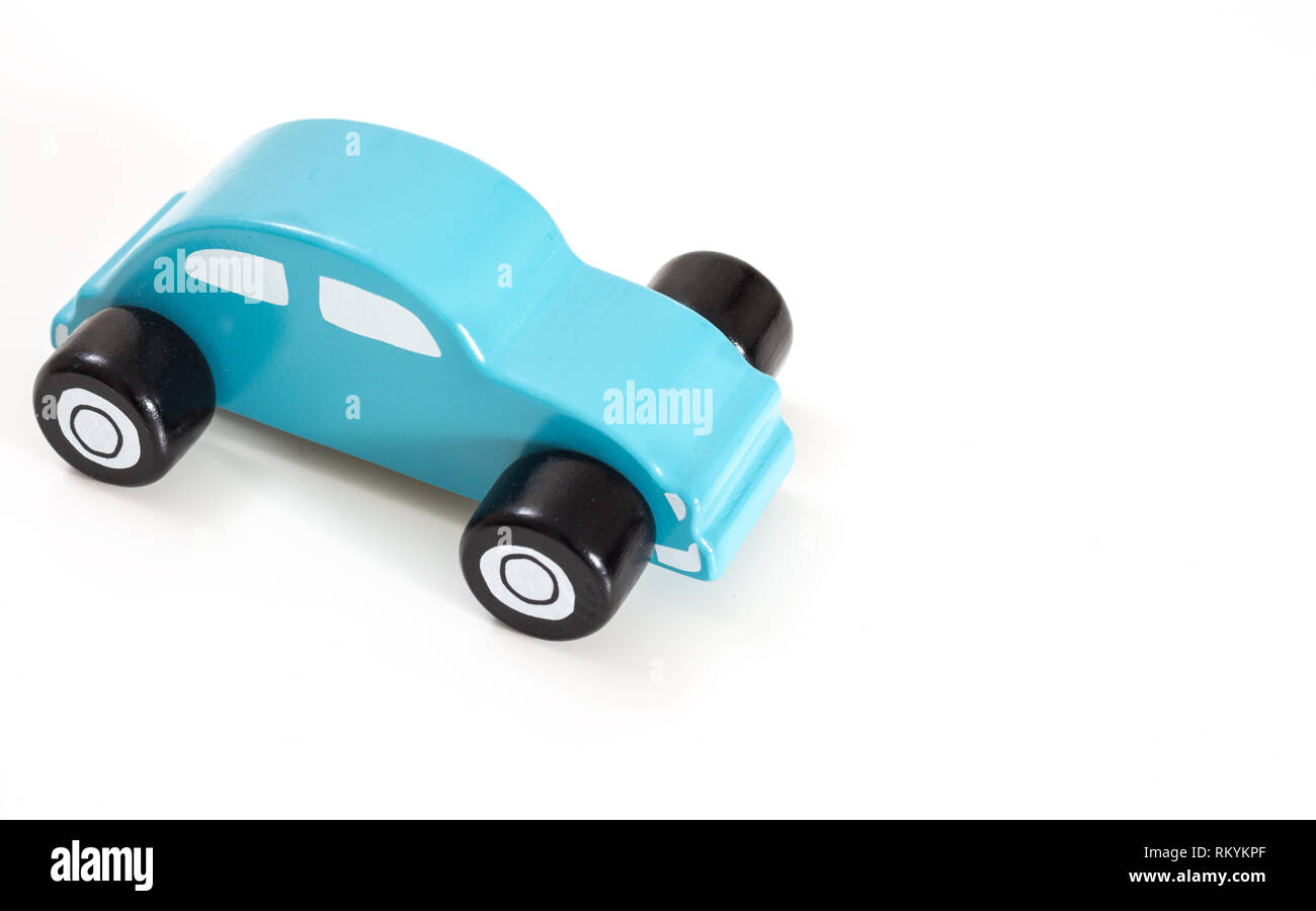 A blue toy car, on white background with copy-space Stock Photo - Alamy