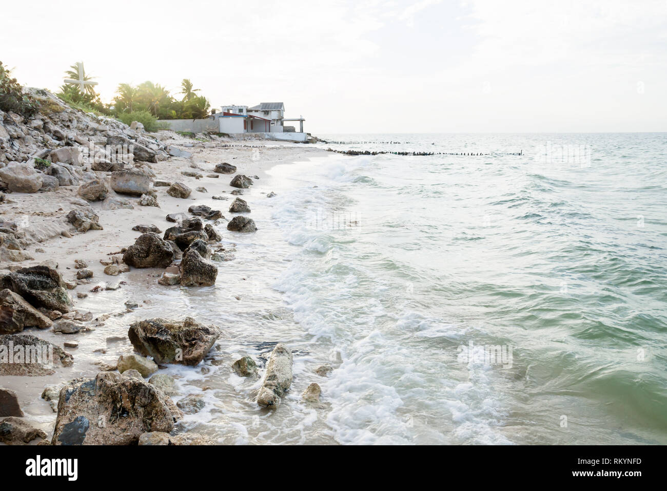 Backlight along the beach coast with beach and houses of Chelem, Mexico ...