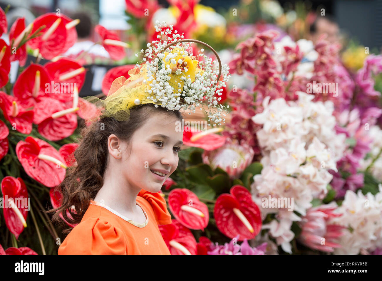 children dressed in colorful clothes at the Festa da Flor or Spring ...